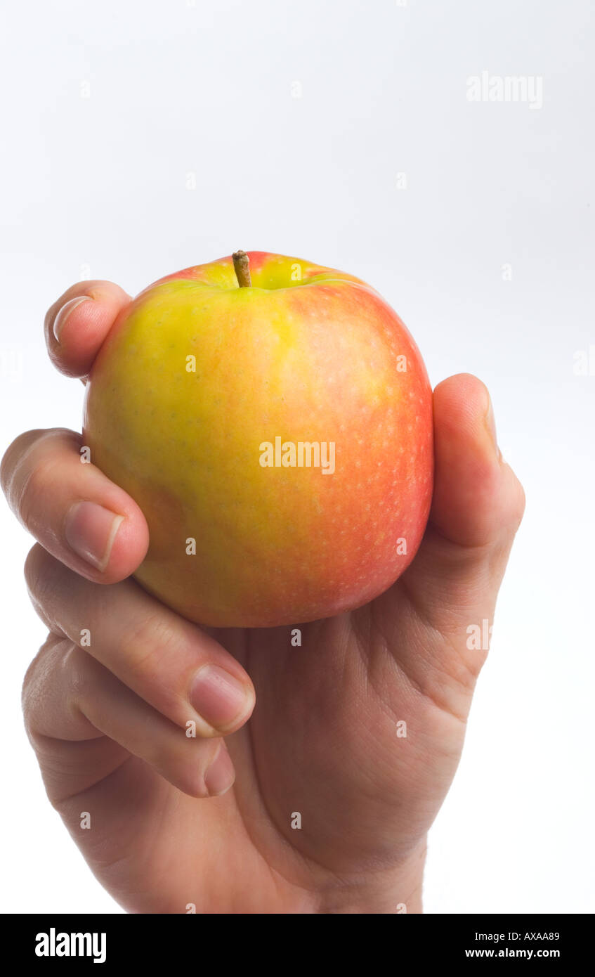 hand with apple Stock Photo - Alamy