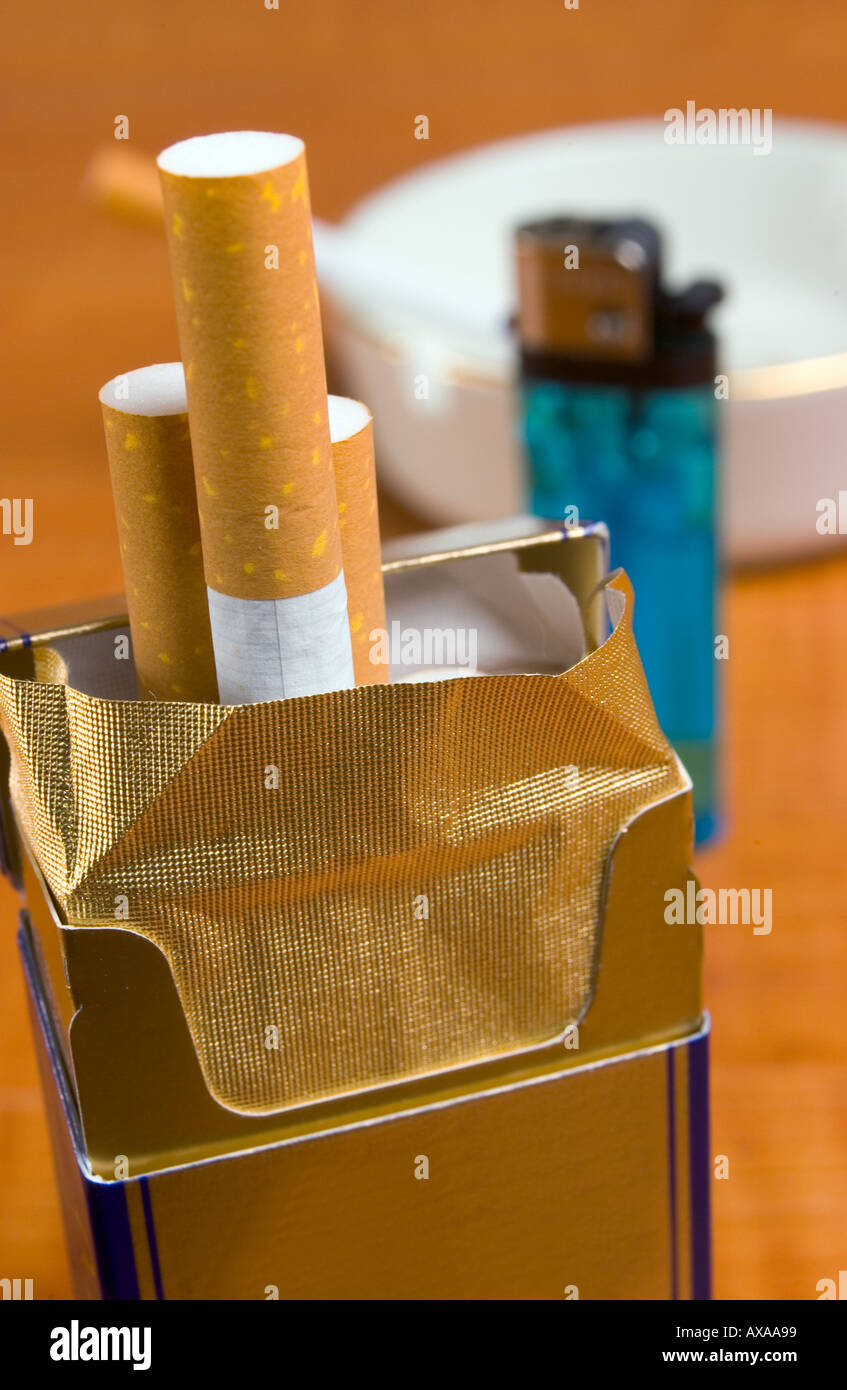 packet of cigarettes with an ashtray Stock Photo - Alamy