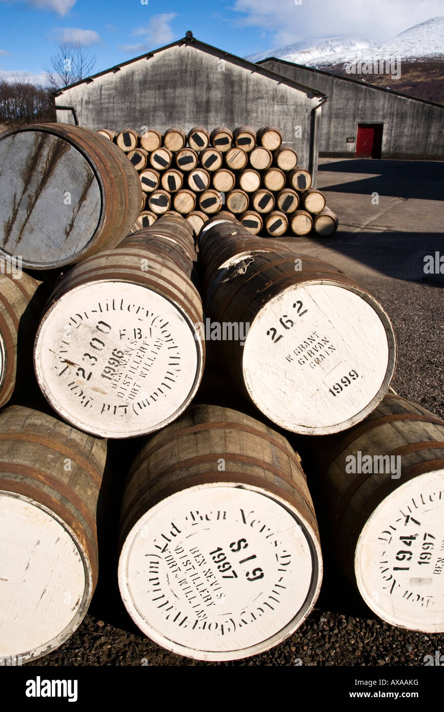 Stacked oak whisky casks at the Ben Nevis distillery Lochaber Scotland ...
