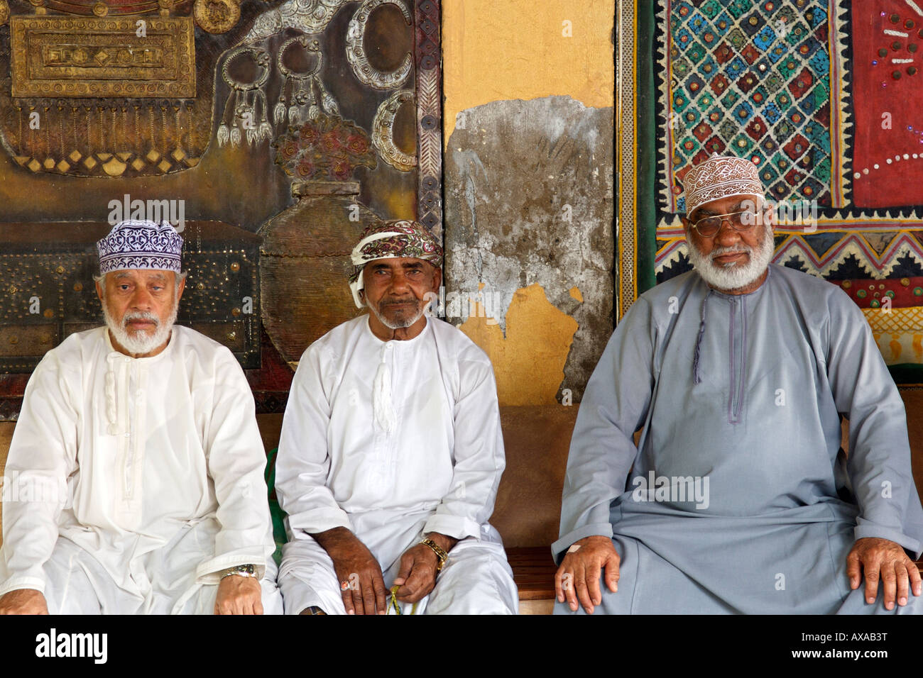 Omani men sitting in the Mutrah souk near Muscat, the capital of the ...