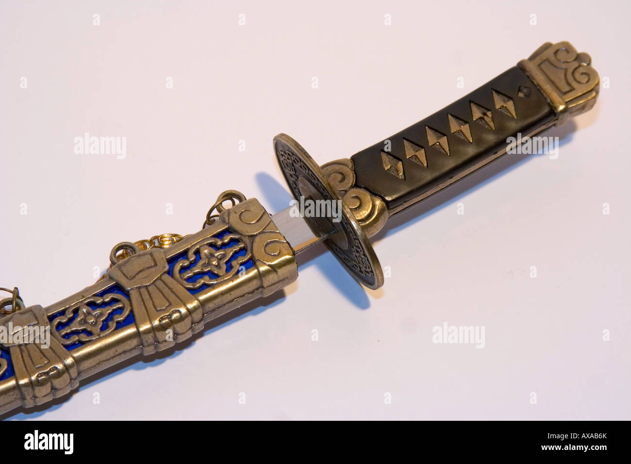 Vintage sword isolated on white Stock Photo - Alamy