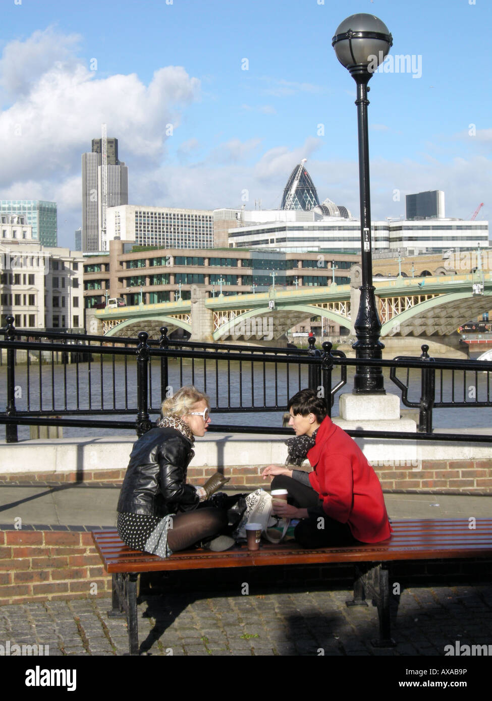 UK Ladies talking by the Thames at the South Bank London Photo by Julio ...