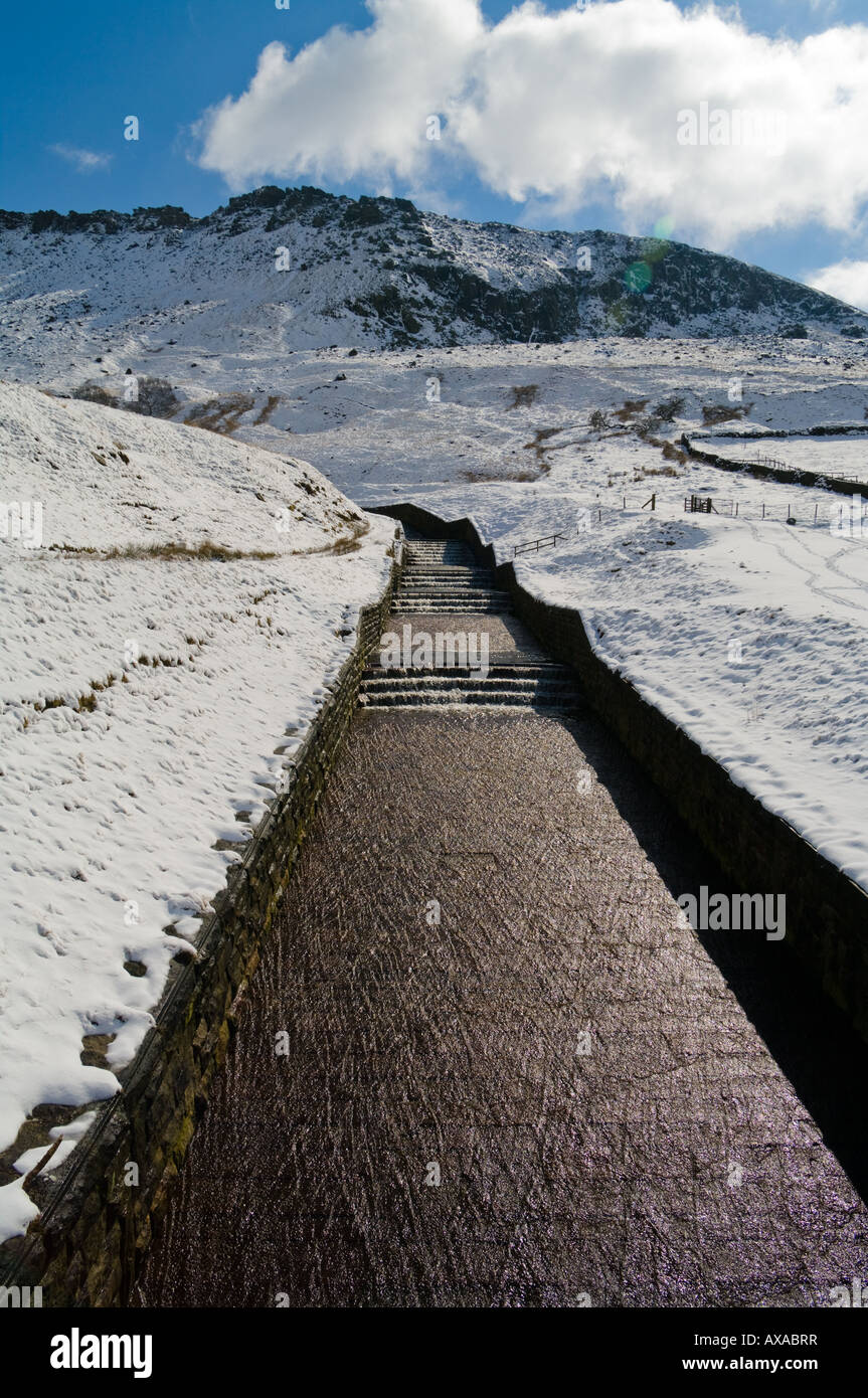 Reservoir spillway Pennines in winter with snow Stock Photo - Alamy