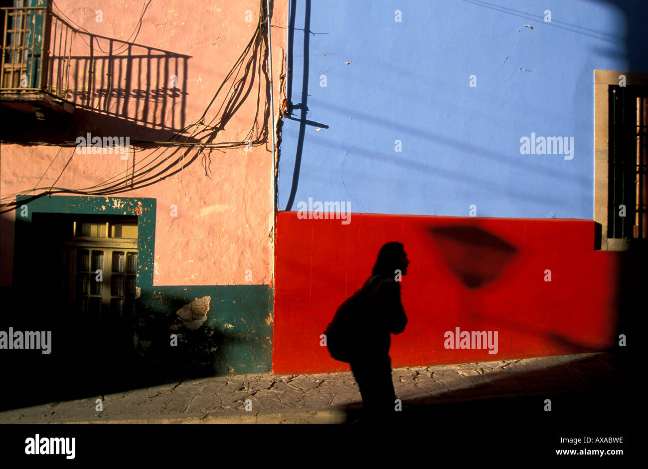 Shadow on colorful walls at Centro Historico, Guanajuato, Mexico Stock ...