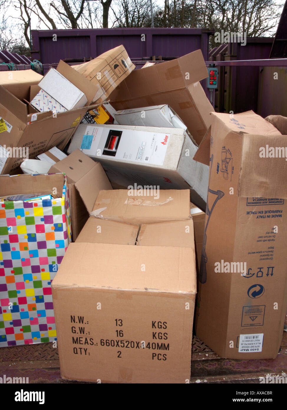 piles of cardboard boxes piled up for recycling at recycling depot ...