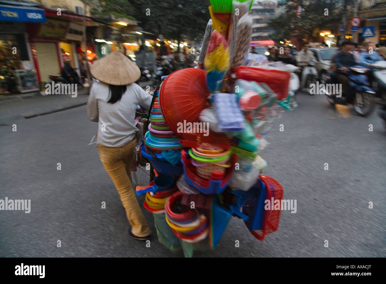 Vendor carrying goods on a bicycle Hanoi Vietnam Stock Photo - Alamy