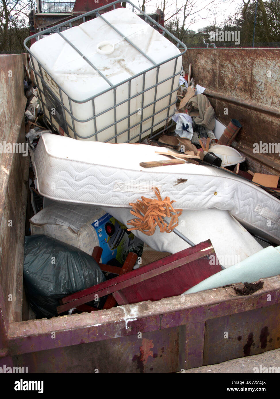 pile of rubbish building up in a rubbish skip at waste depot in the uk ...
