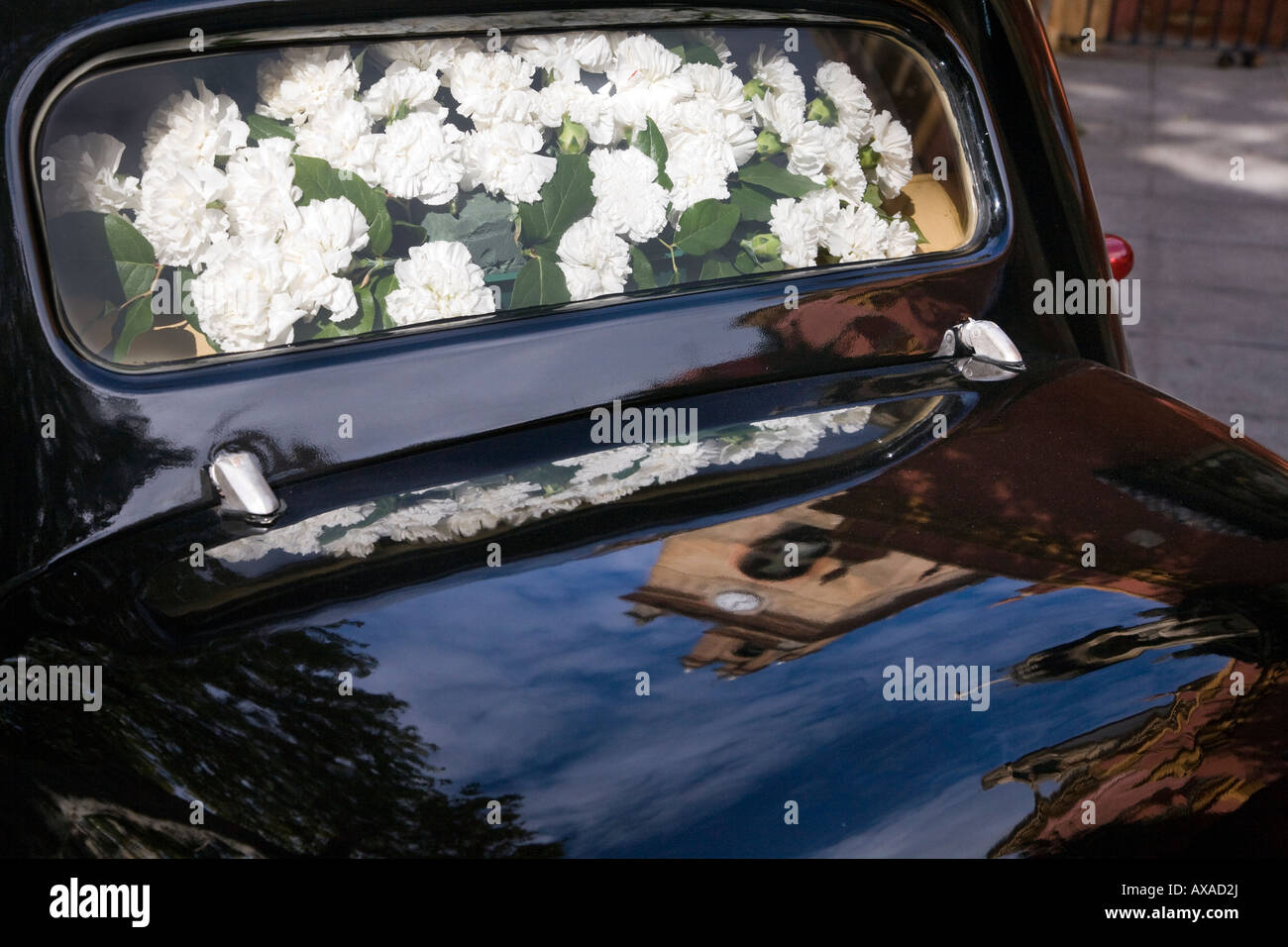 Vintage car rear window plenty of white flowers for a wedding, Seville ...