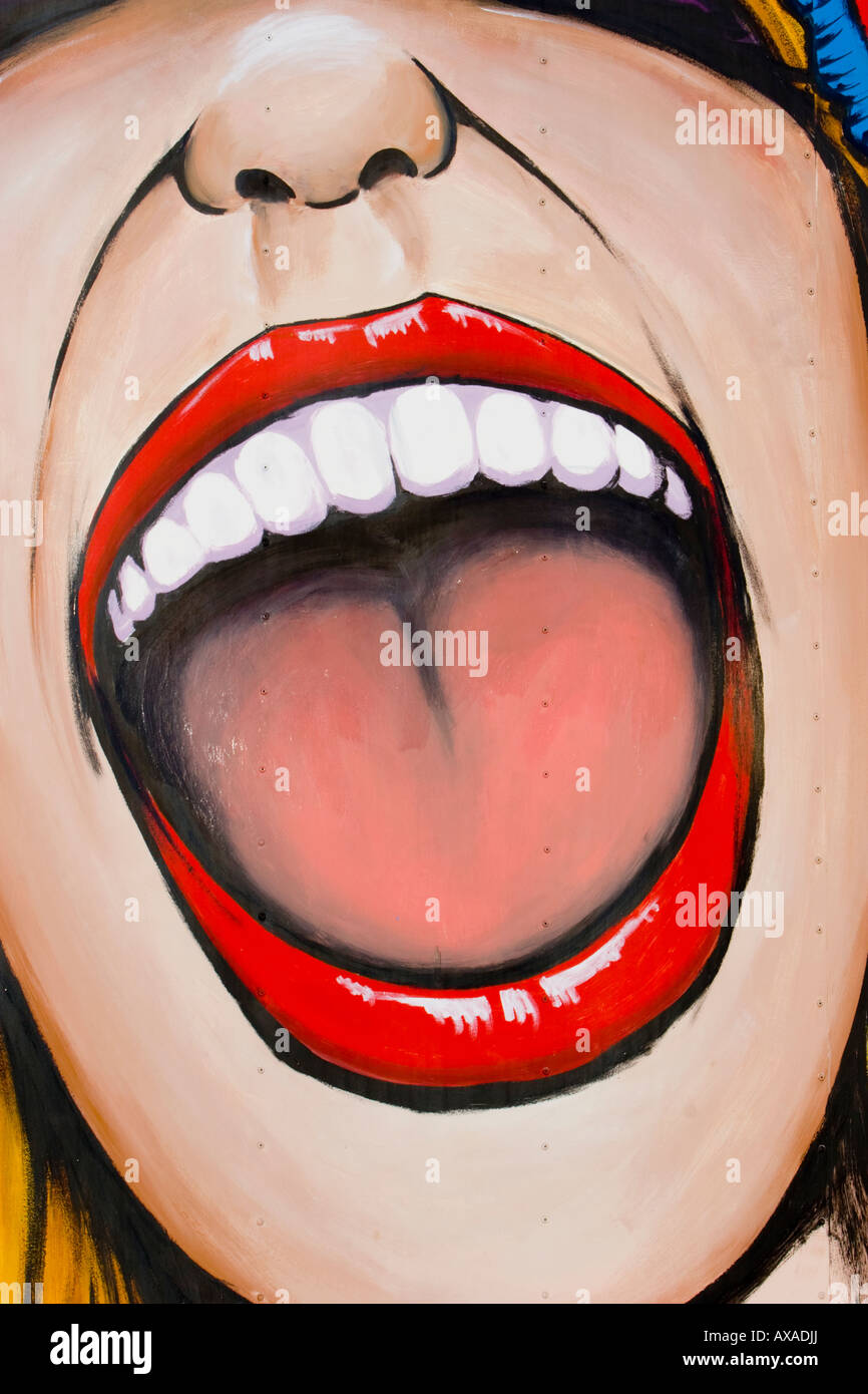 Female laughing face wall art at carnival in USA Stock Photo - Alamy