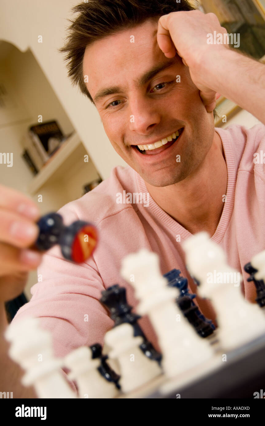 Smile man thinking chess hi-res stock photography and images - Alamy