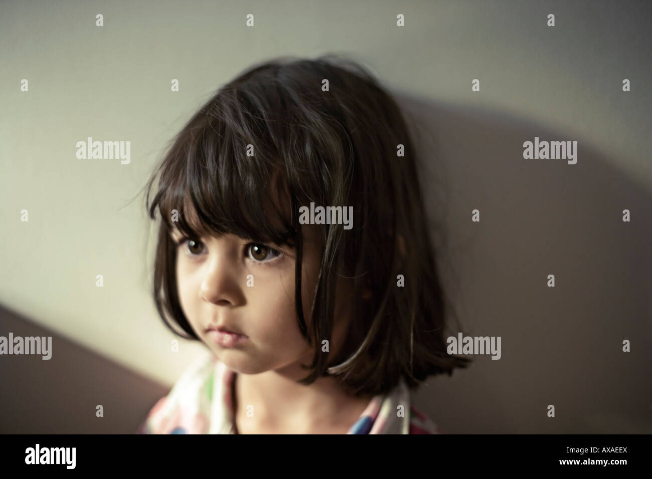 Little girl in beam light hi-res stock photography and images - Alamy