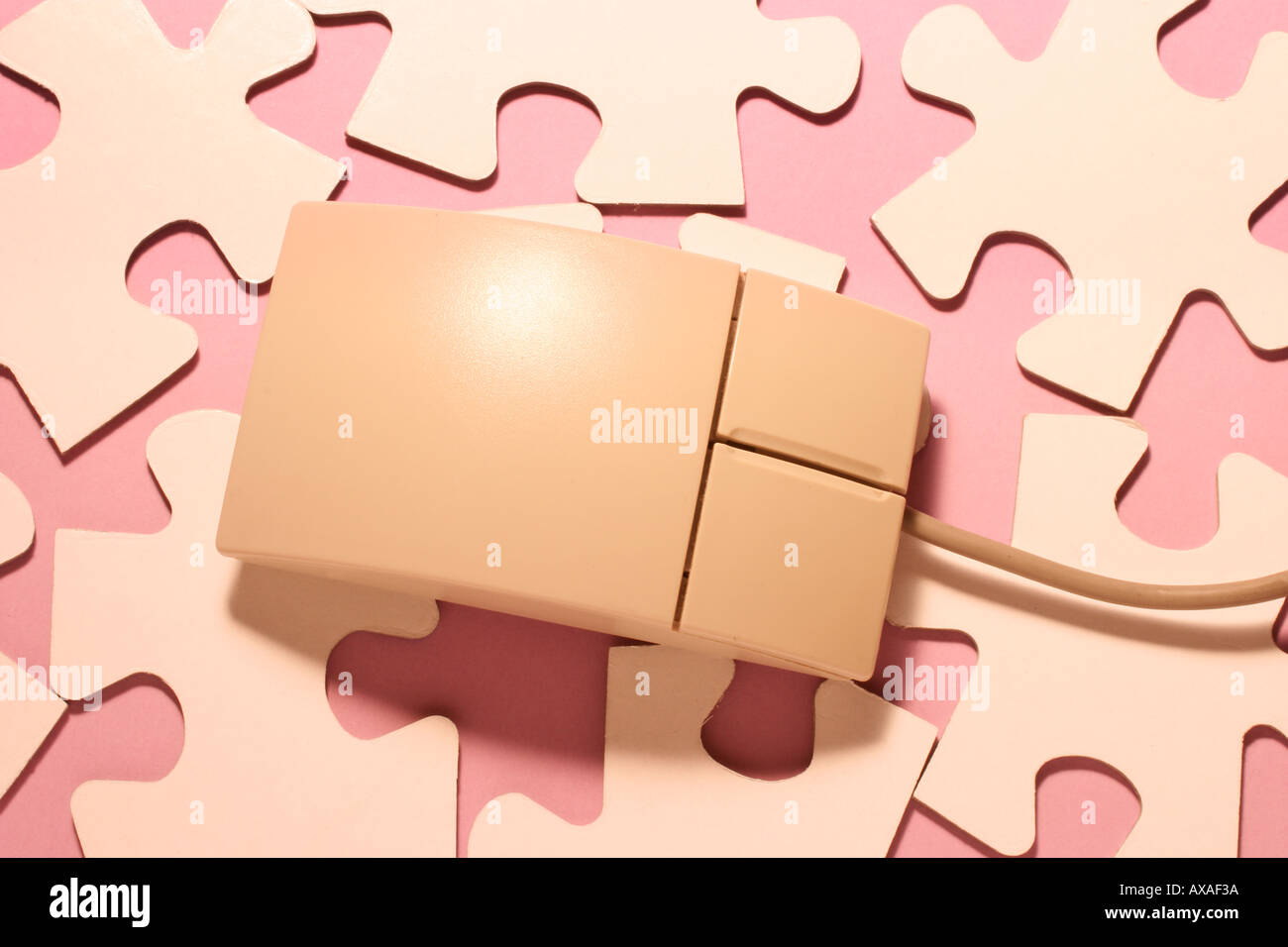 Computer Mouse and Jigsaw Puzzle Pieces Stock Photo - Alamy