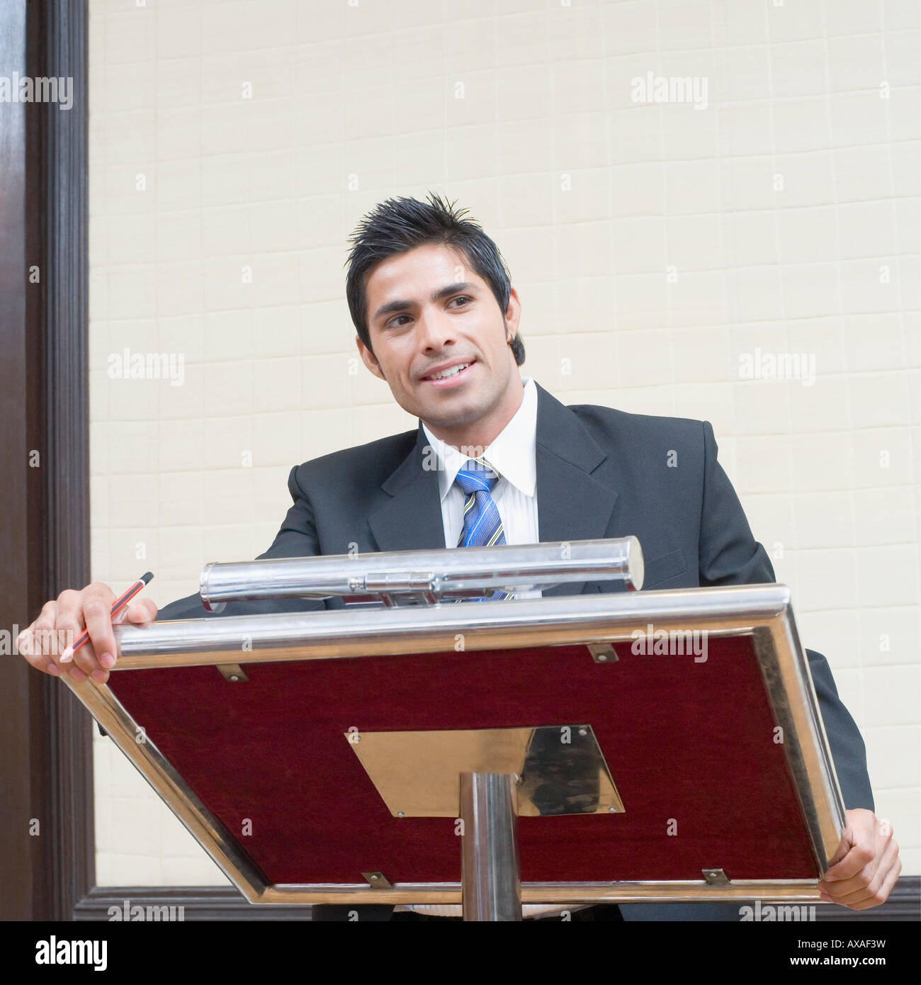 Businessman standing lectern hi-res stock photography and images - Alamy