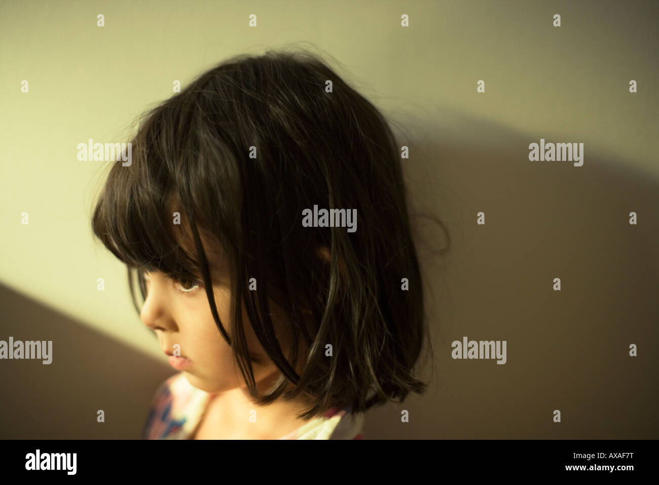 Little Girl In Beam Light High Resolution Stock Photography and Images ...