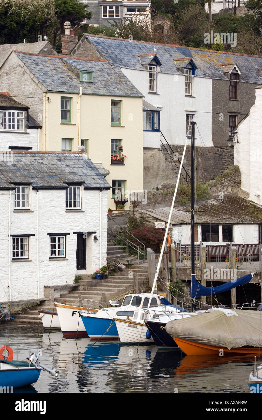 Fishing boats and houses at Polperro Harbour, Cornwall Stock Photo - Alamy