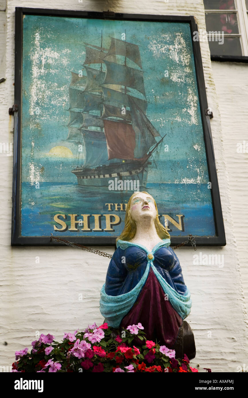 The Ship Inn sign and ships figure head at Polperro, Cornwall Stock ...