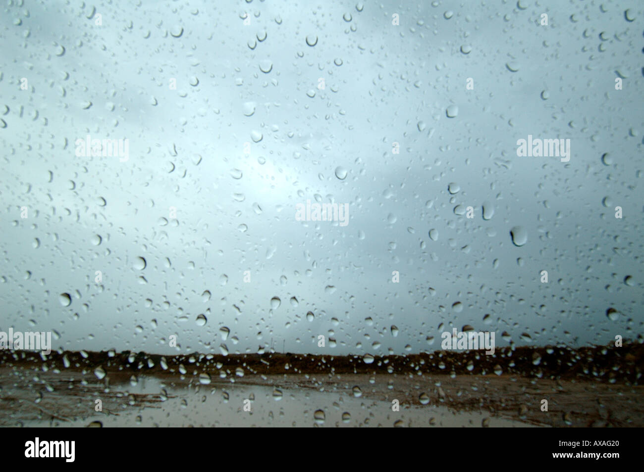 Rain falling on windshield hi-res stock photography and images - Alamy