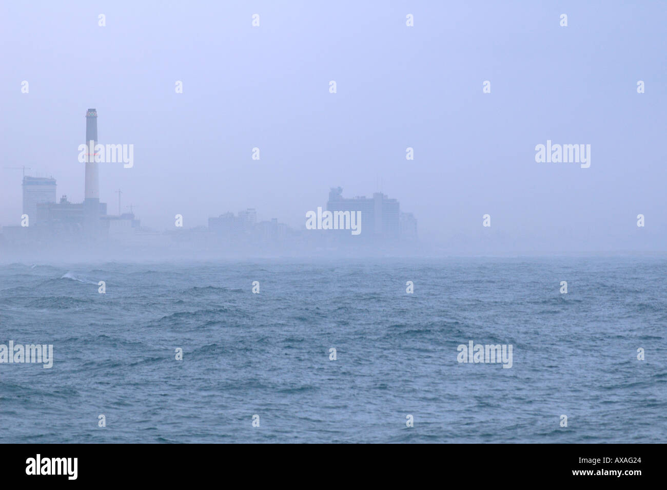 Early morning fog covers the Electric power plant at the Mediterranean ...