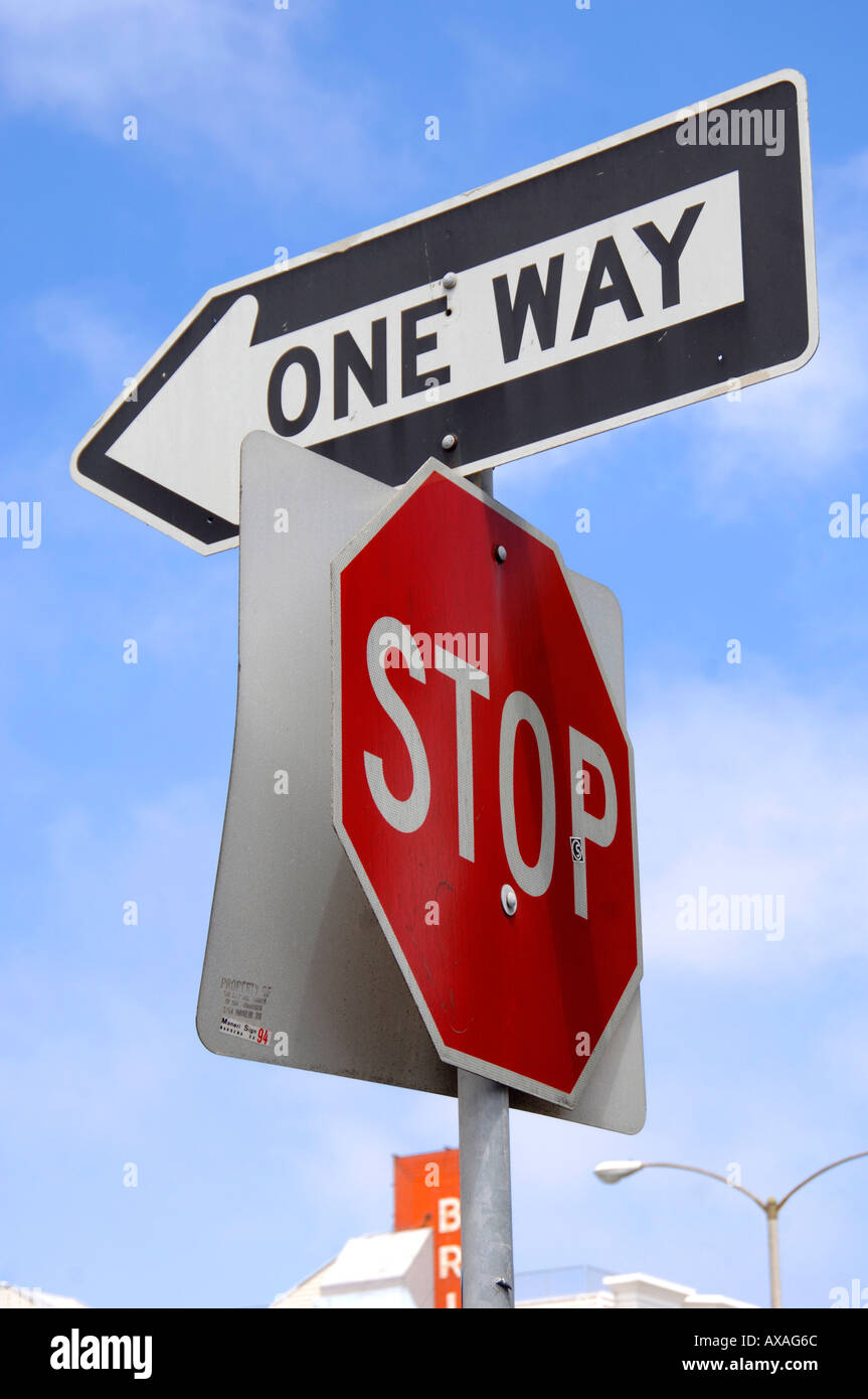One Way and Stop Sign Stock Photo - Alamy