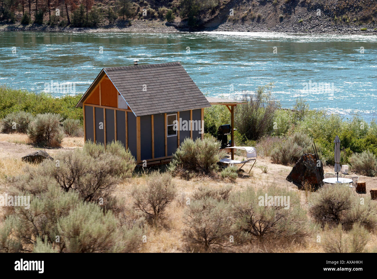 Holiday shack in the arid landscape of the Thompson River valley near ...