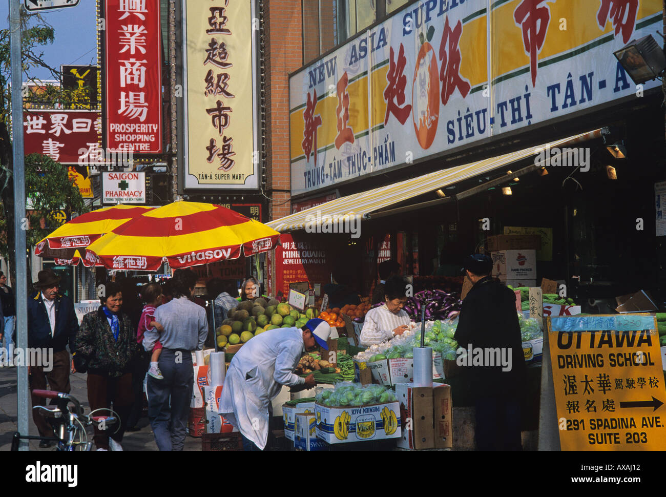 Toronto Chinatown Chinese shops on Spadina Avenue with dual language ...