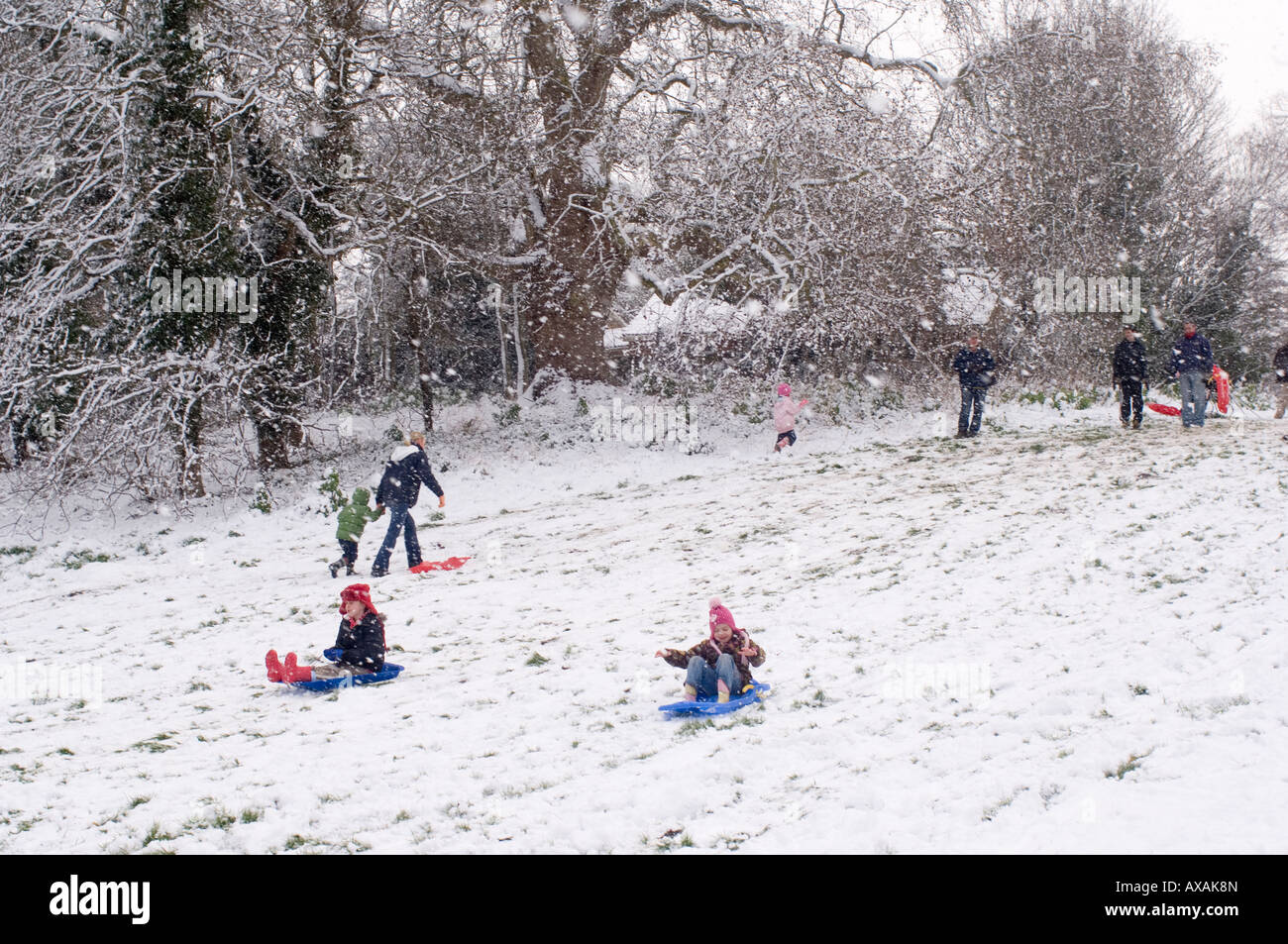 Kids playing in the snow hi-res stock photography and images - Alamy