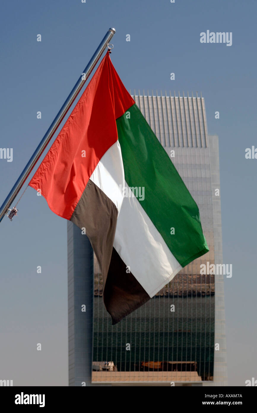 The flag of the United Arab Emirates seen against a backdrop of ...