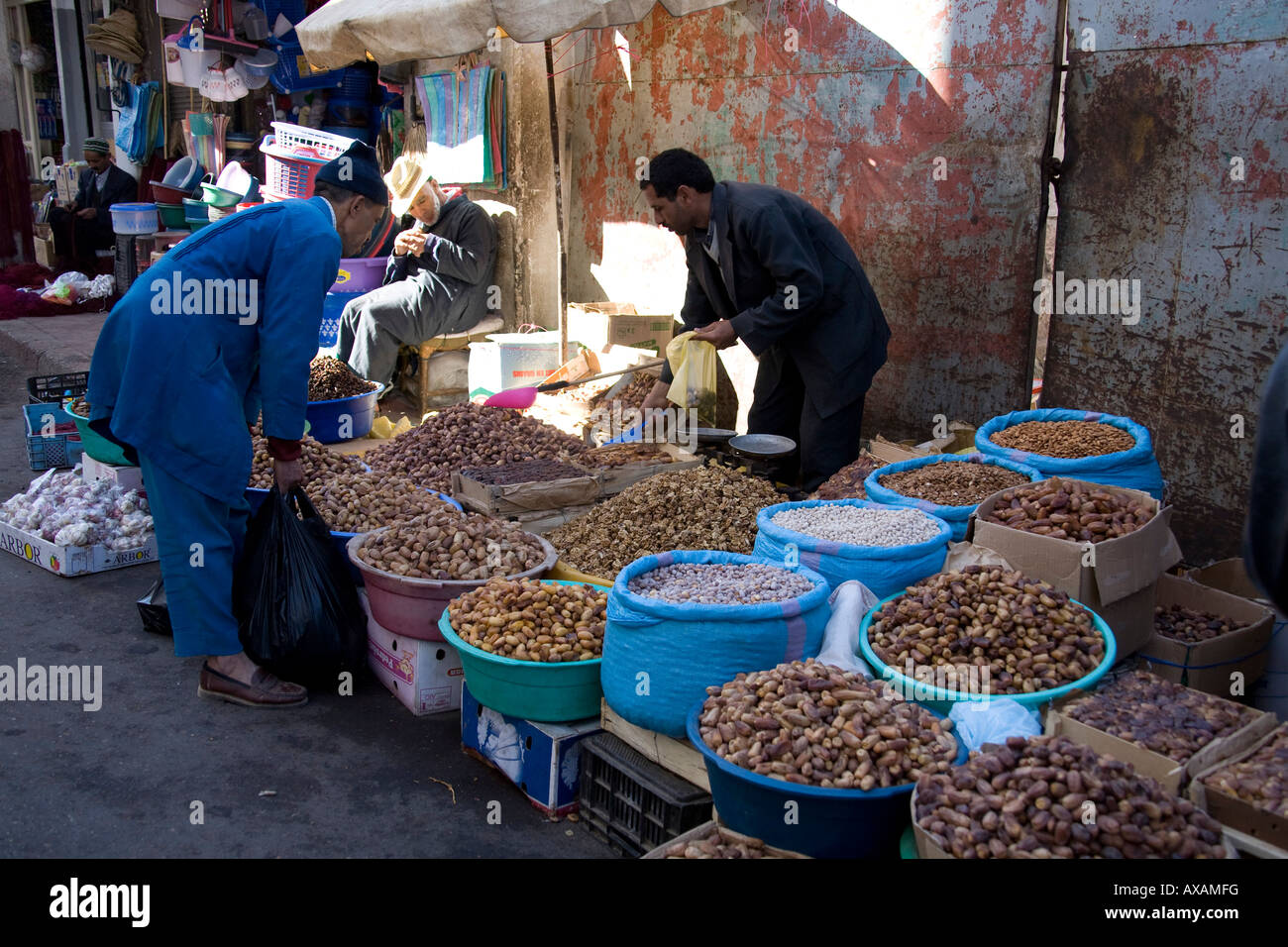 Agadir market, Morocco, North West Africa. Man in street shop selling ...