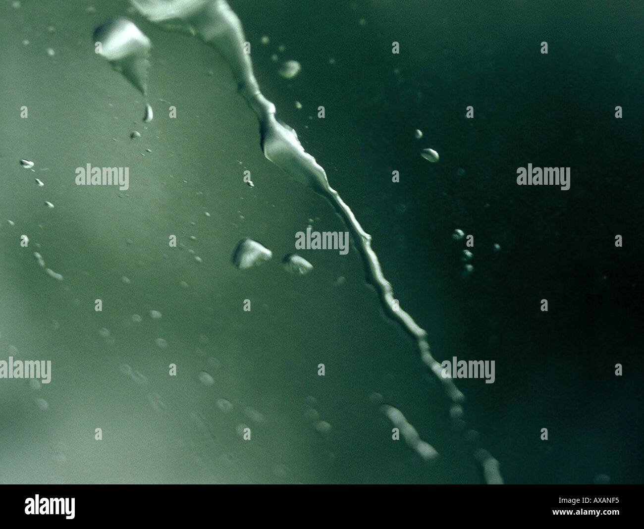 NMB74433 Monsoon rain raindrops on window Stock Photo - Alamy