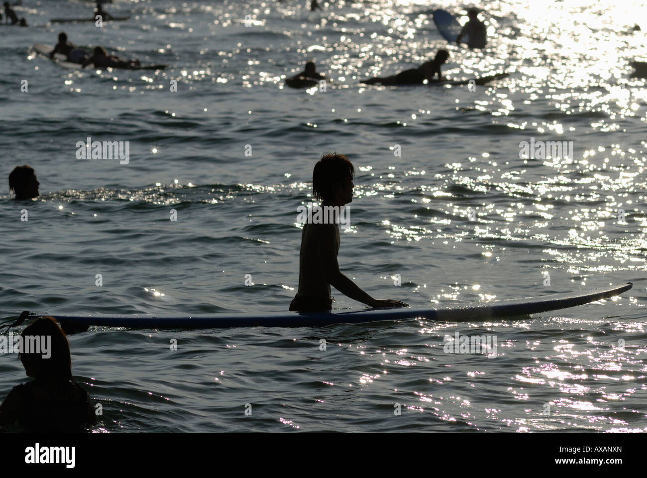 Late afternoon surfing, Waikiki beach, O'ahu Hawaii Stock Photo - Alamy