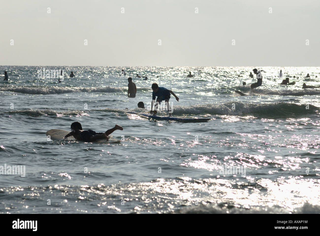 Late afternoon surfing, Waikiki beach, O'ahu Hawaii Stock Photo - Alamy