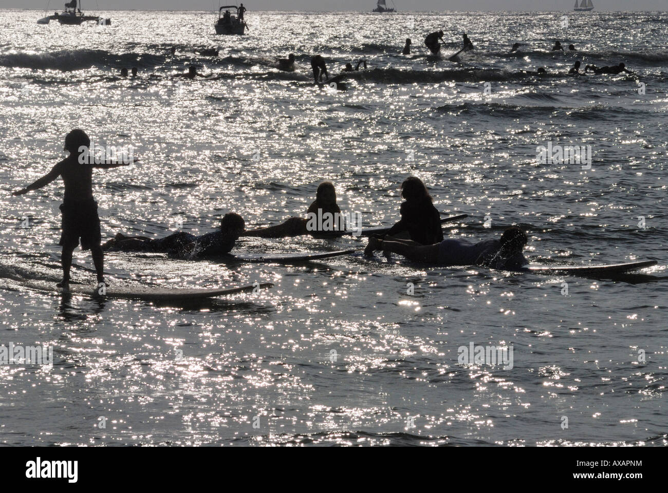 Late afternoon surfing, Waikiki beach, O'ahu Hawaii Stock Photo - Alamy