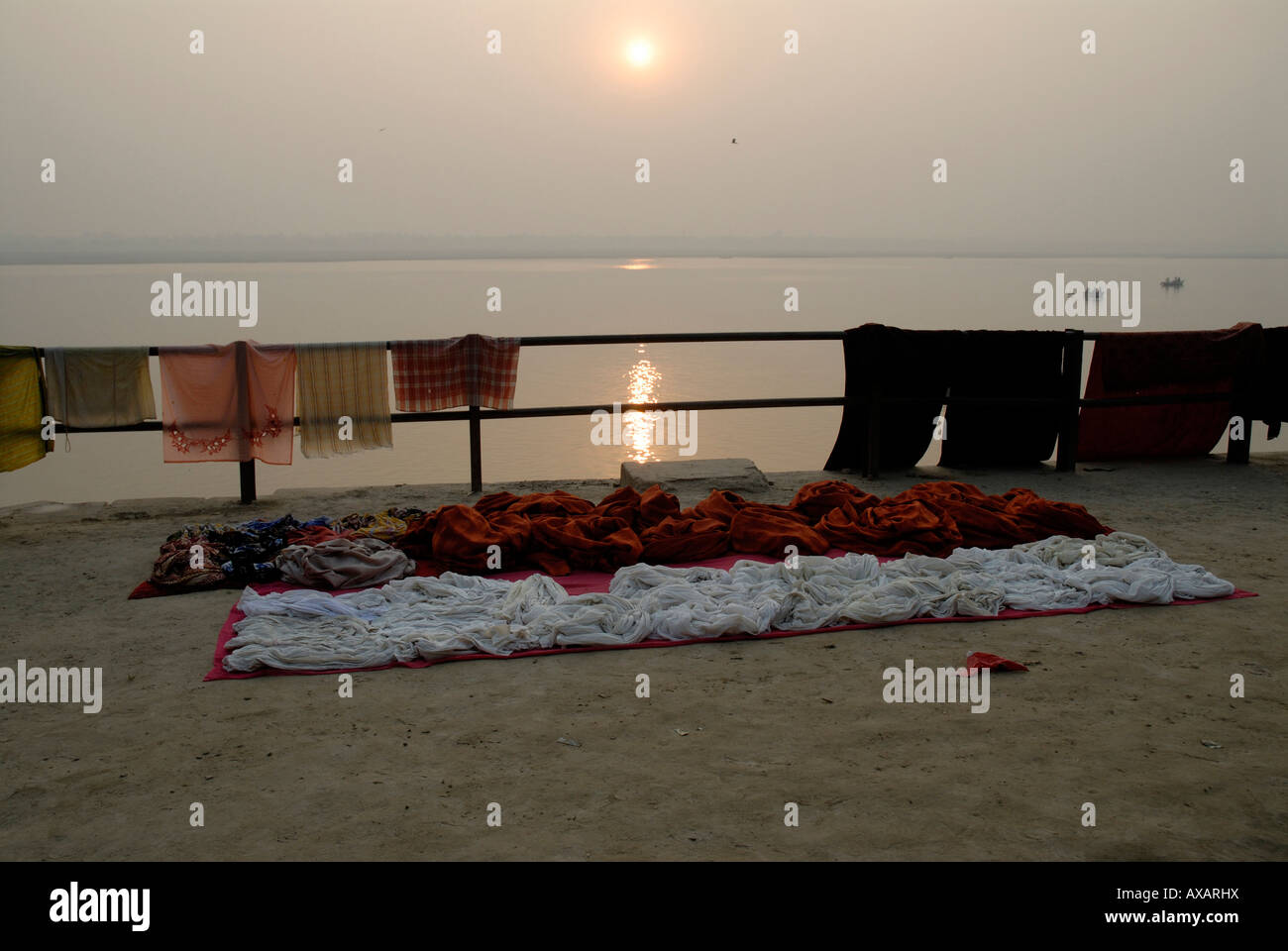 Laundry hanging out to dry on the banks of the Holy River Ganges ...