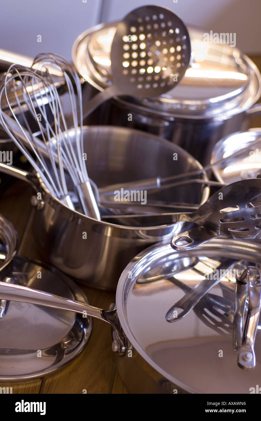 stainless steel pans in a kitchen Stock Photo - Alamy