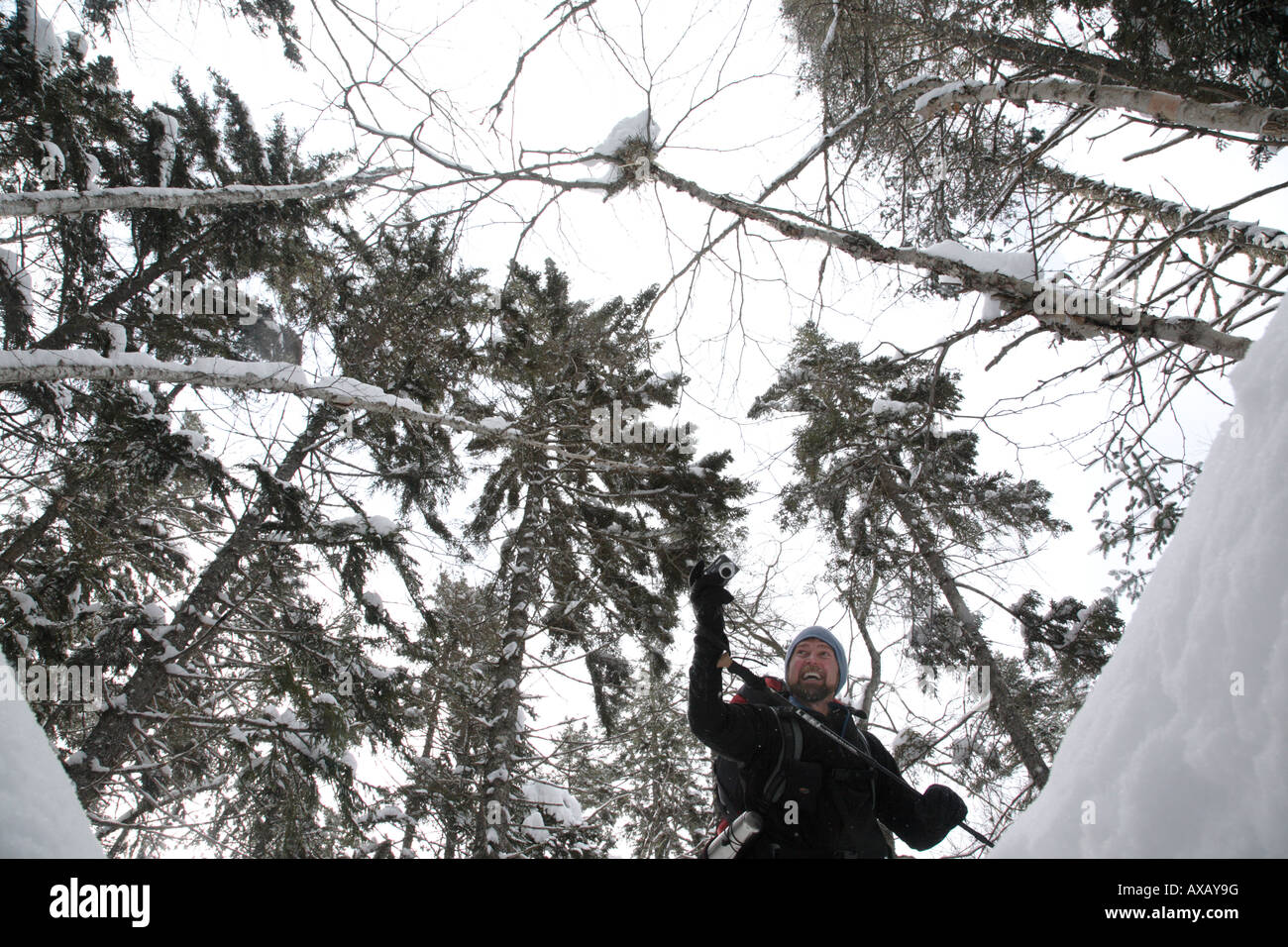 Hikers snowshoeing on the Hancock Notch Trail during the winter months ...