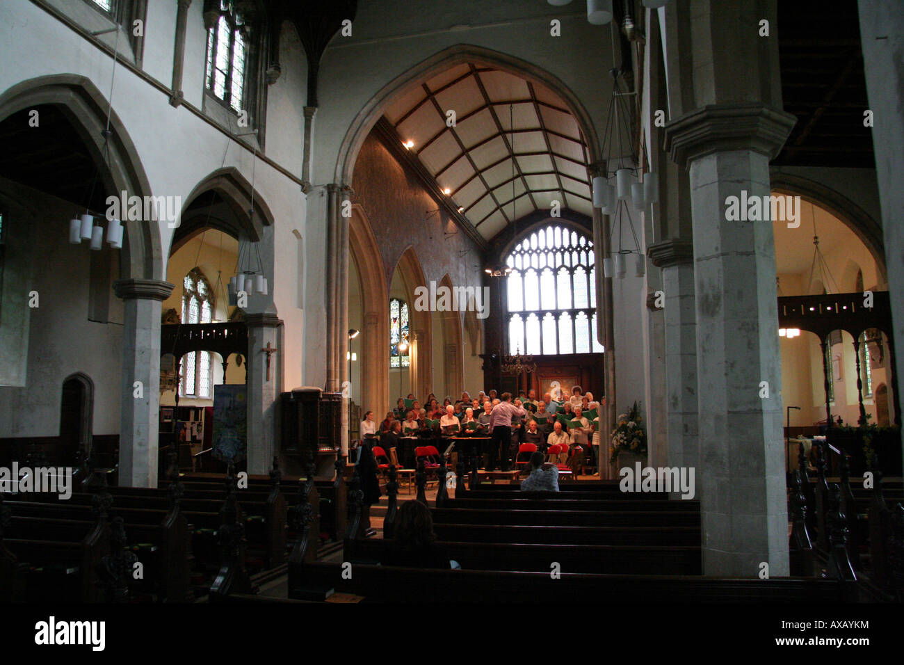 A mixed choir rehearse in a beautiful old Suffolk church Stock Photo ...