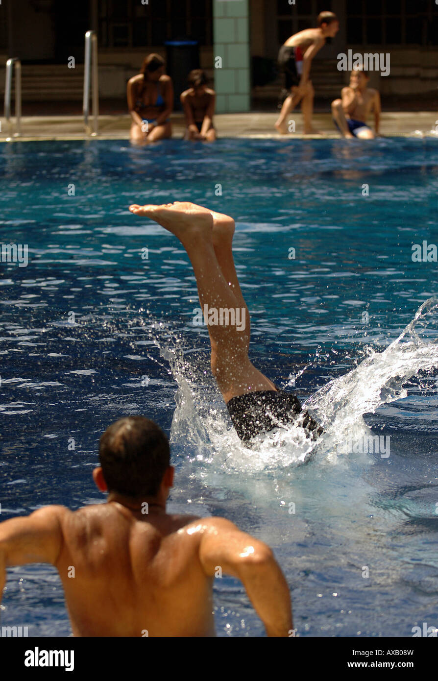 A boy jumping into the water Stock Photo - Alamy