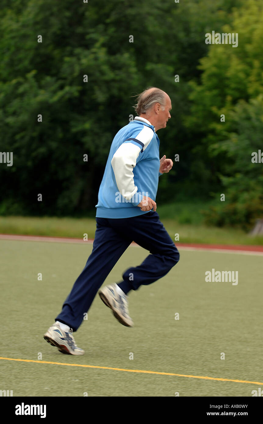 An elderly man jogging Stock Photo - Alamy