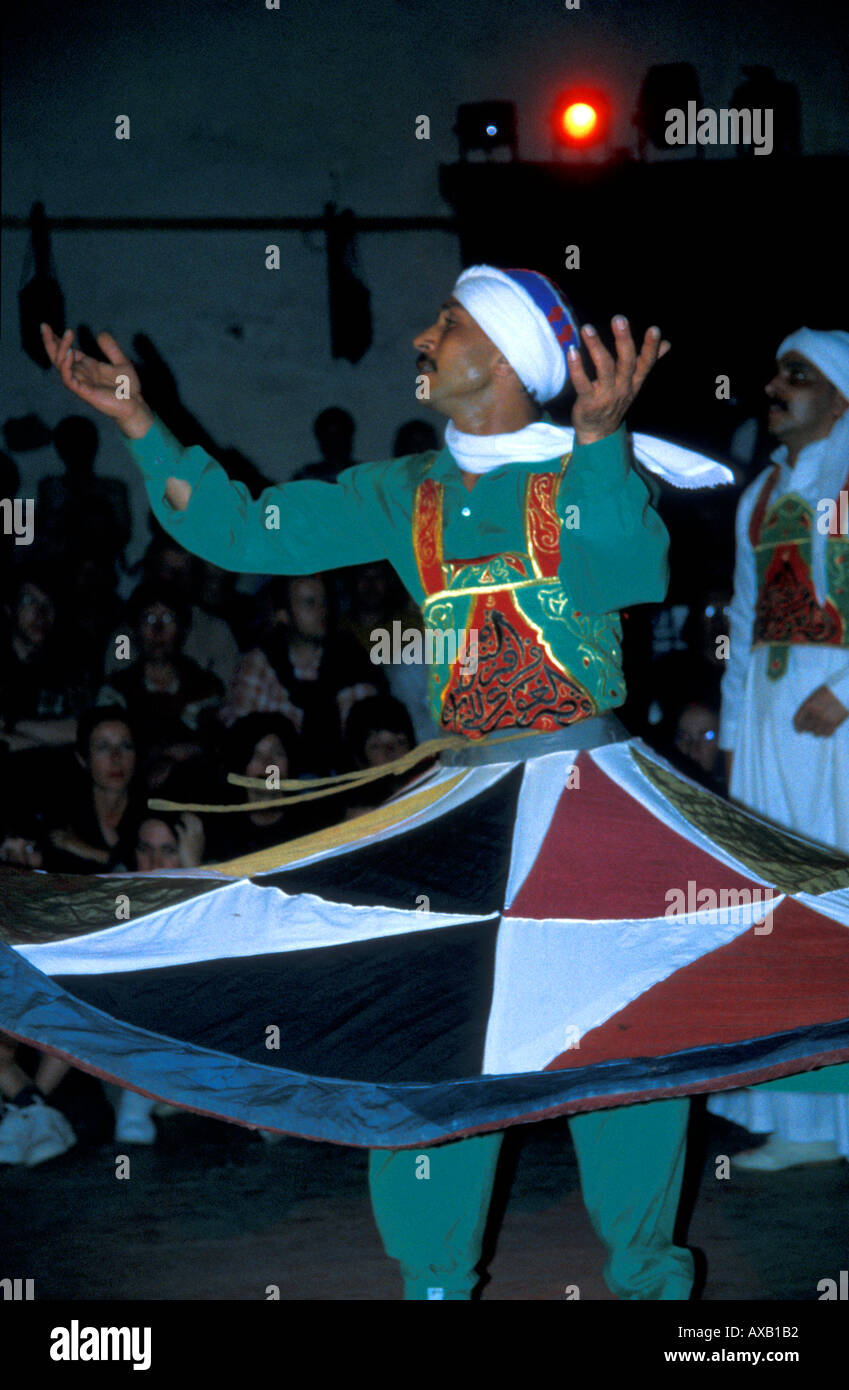 The Al Tannoura Egyptian Heritage Dance Troupe performing traditional ...