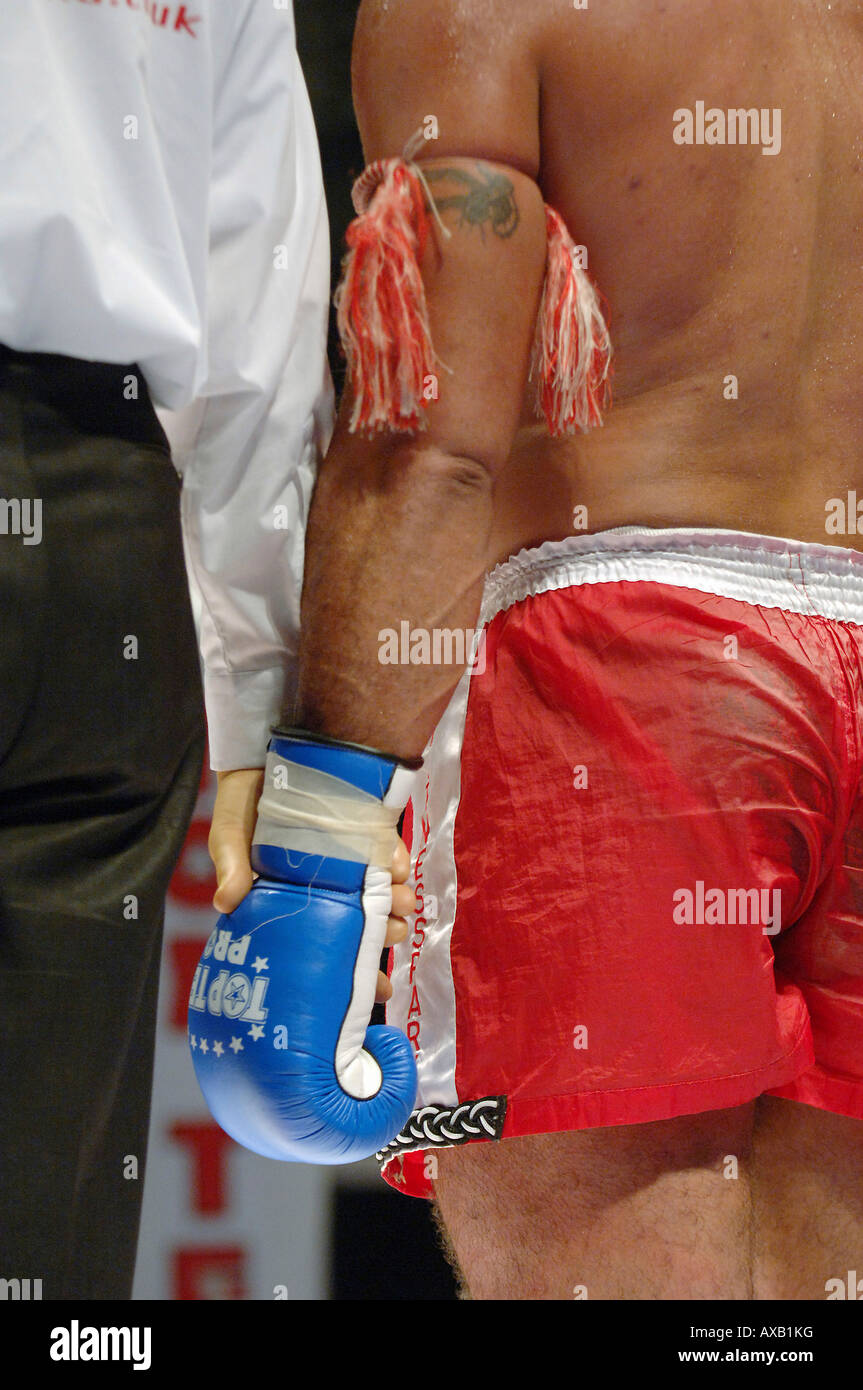 Hand of a boxer held by a referee Stock Photo - Alamy