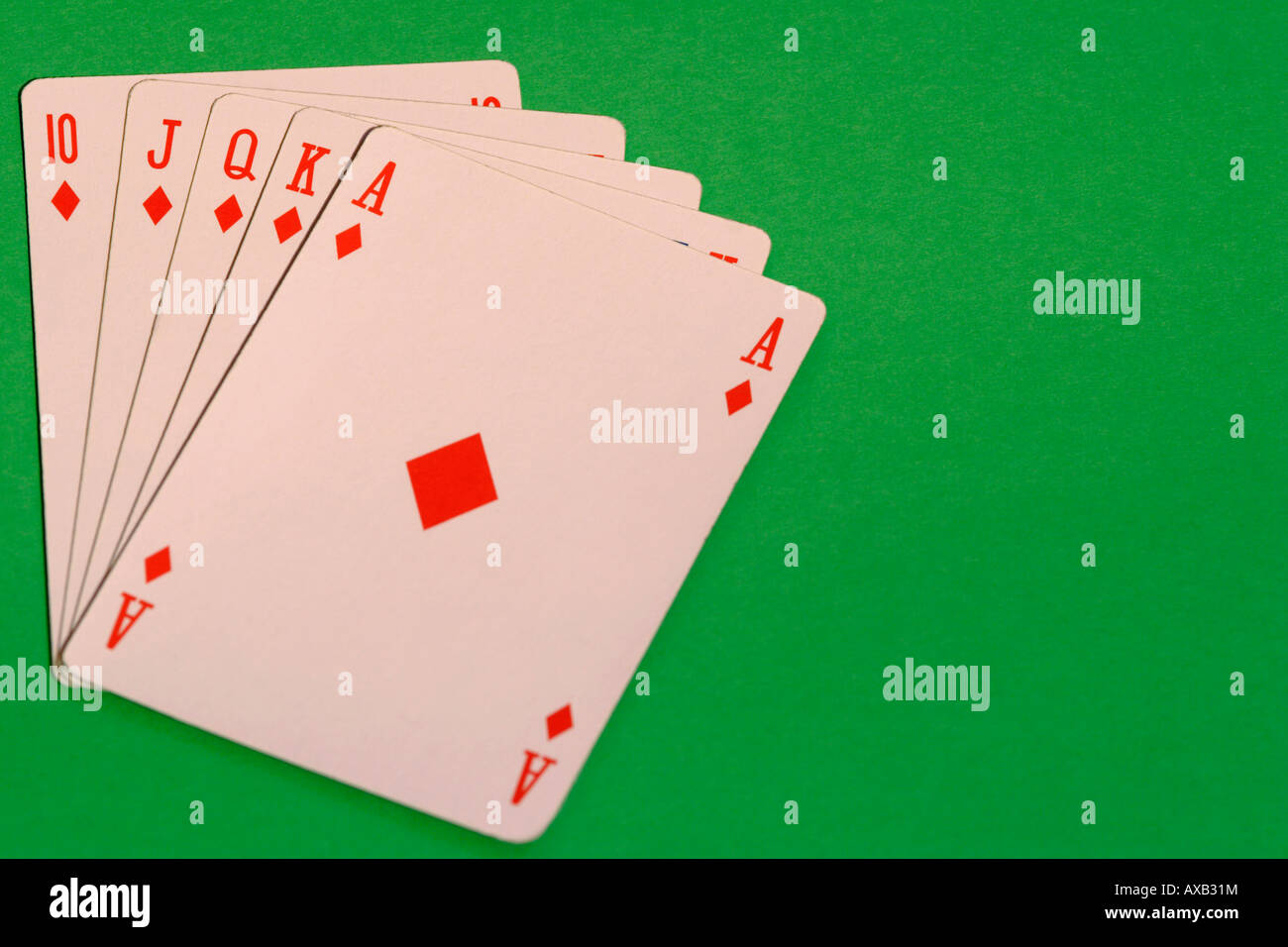 Playing cards royal flush of red diamonds close up Stock Photo - Alamy