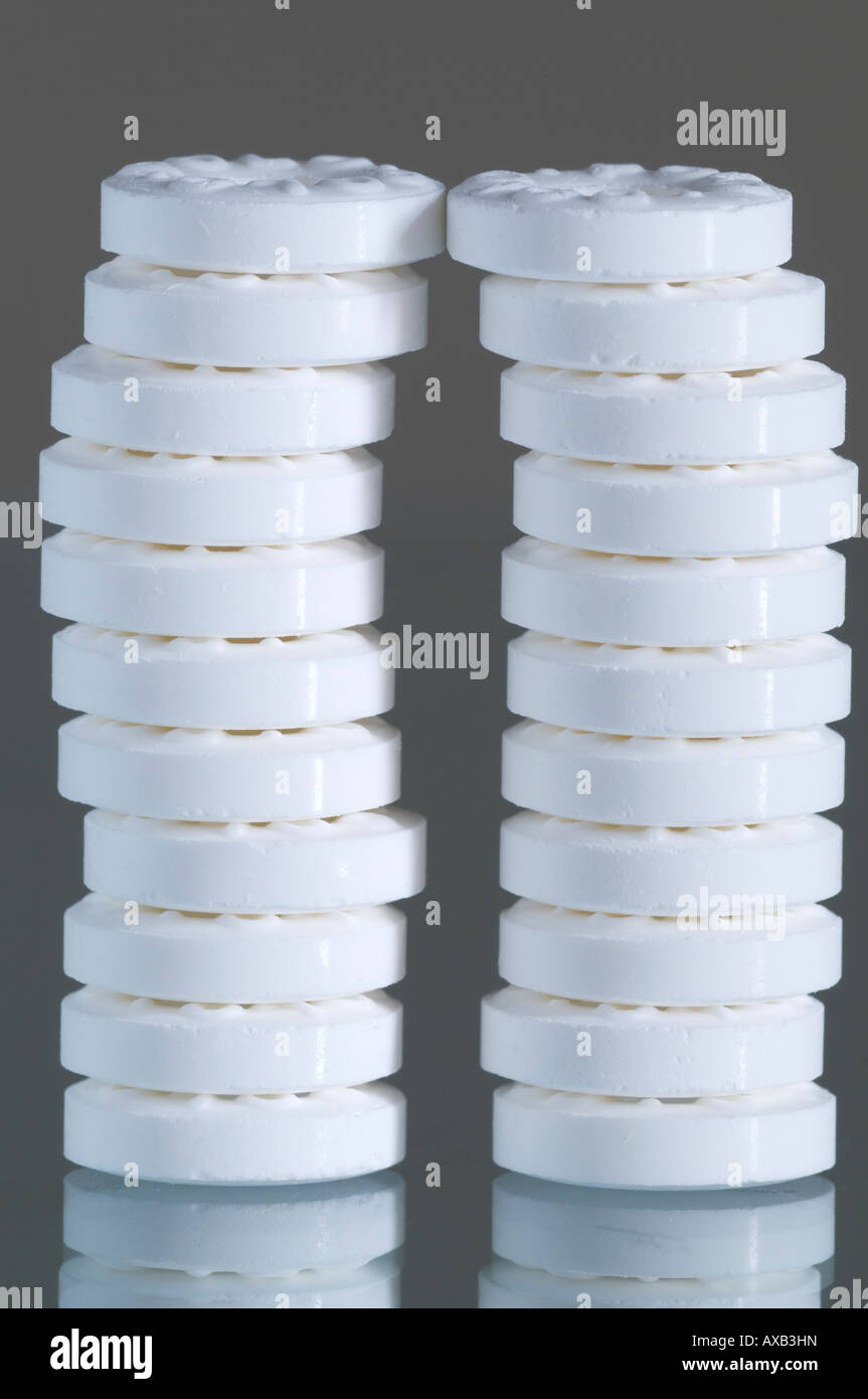 Double stack of white mints Stock Photo - Alamy