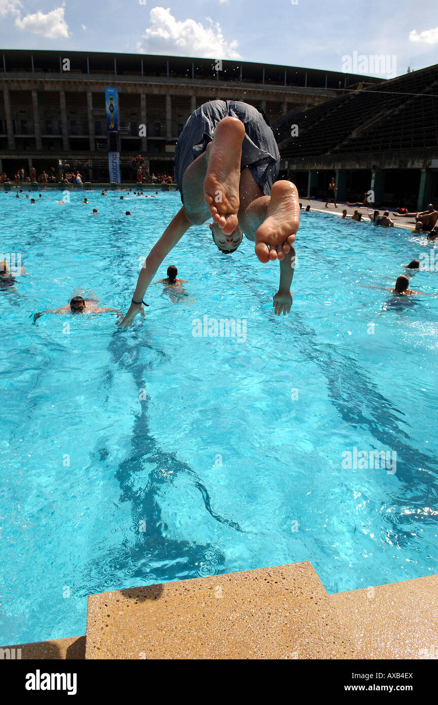 A boy jumping into the water Stock Photo - Alamy