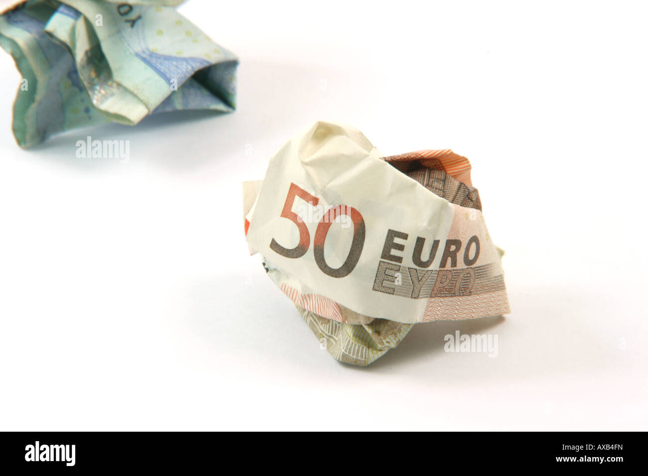 two crumpled euro banknotes isolated on white background with copy ...