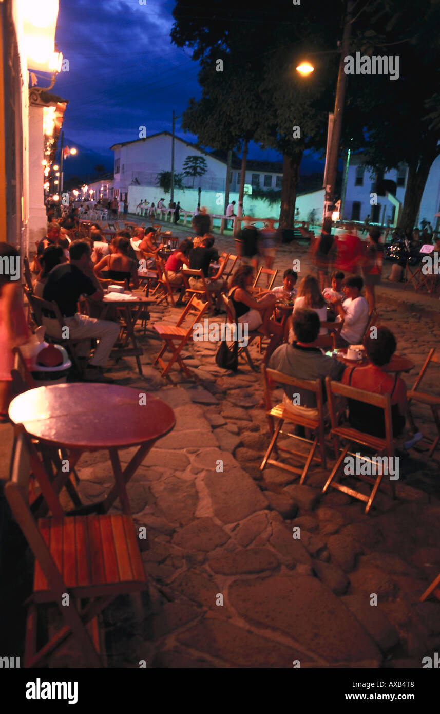 People at a street cafe in the evening, Paraty, Rio de Janeiro, Brazil ...
