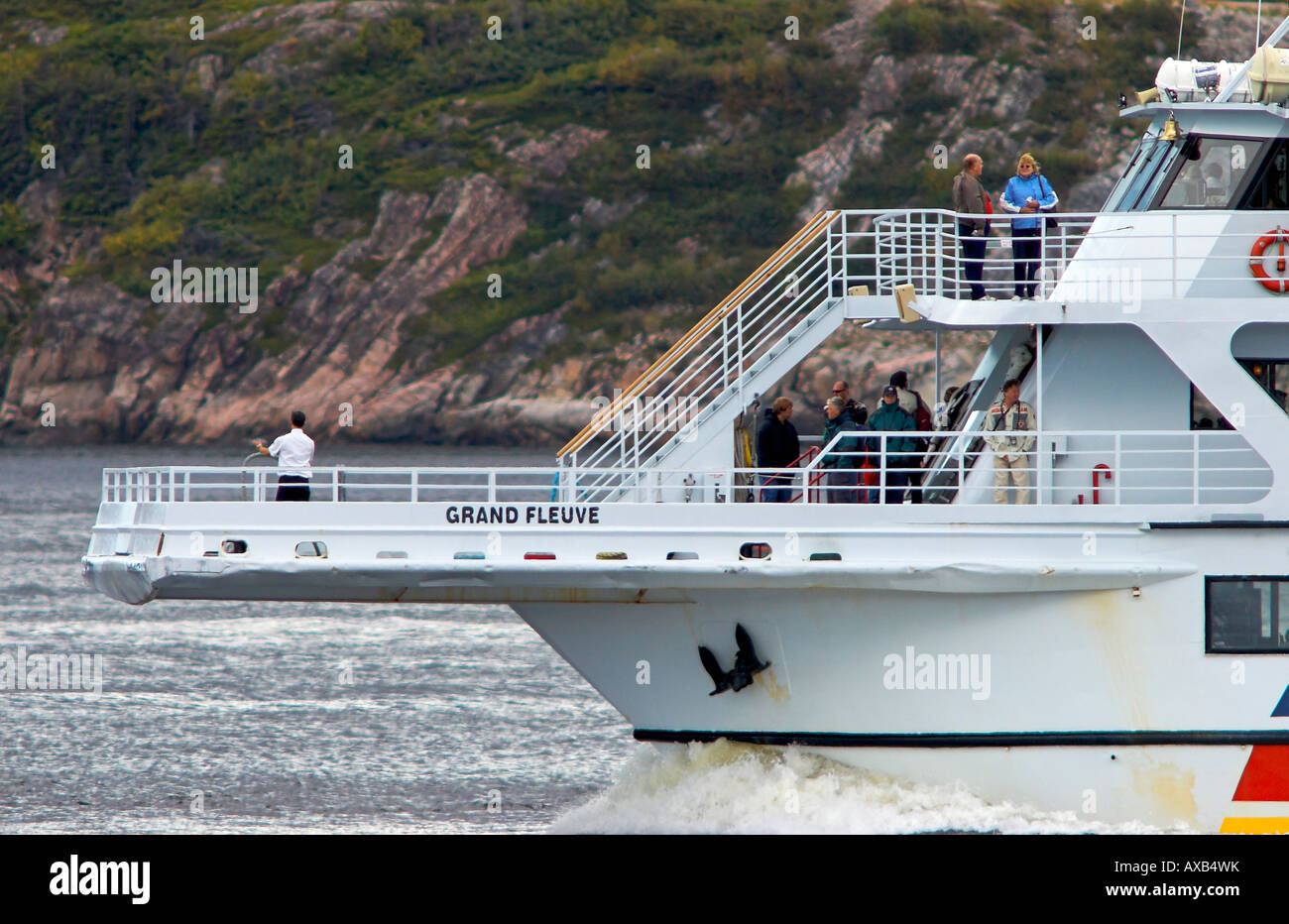 A "Croisières AML" whale watching cruising ship passing by on the ...