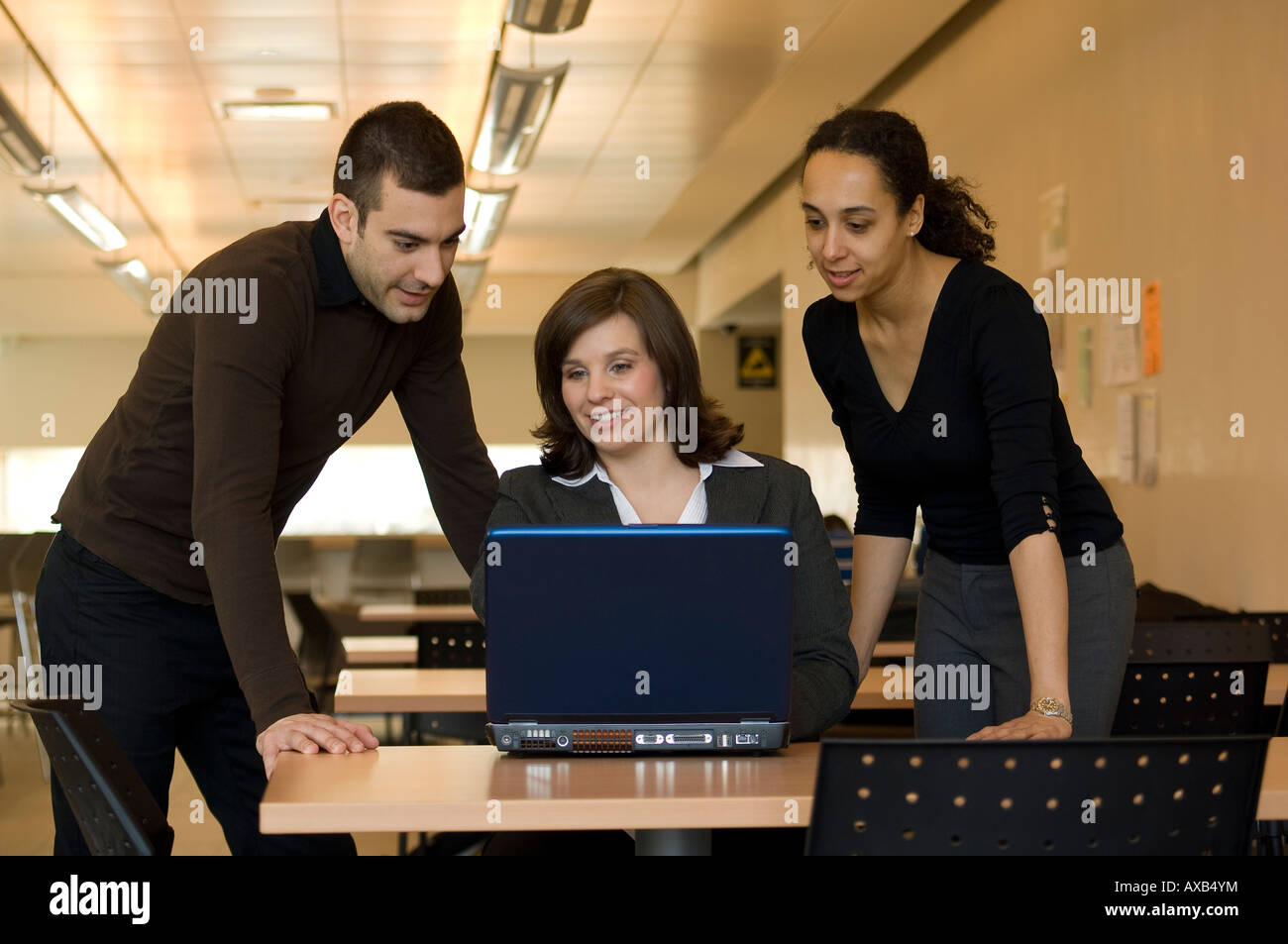 Team of office workers working together Stock Photo - Alamy