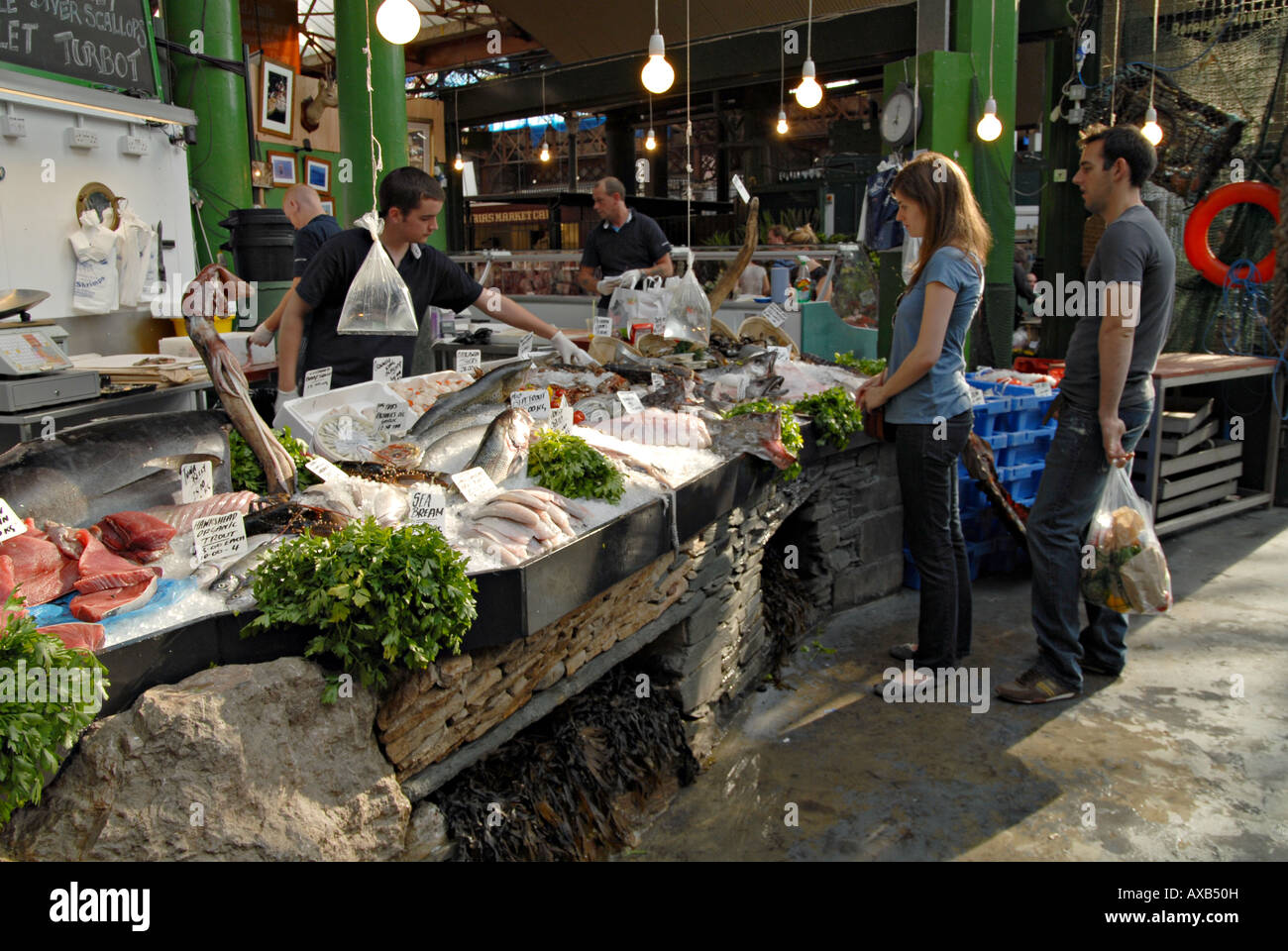 FISHMONGER AT BOROUGH MARKET IN LONDON Photo Julio Etchart Stock Photo ...