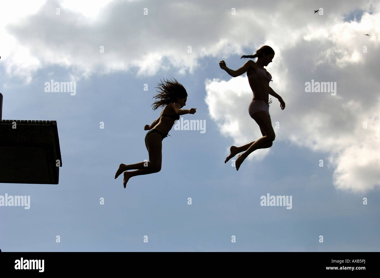 Girls two jumping teens hi-res stock photography and images - Alamy