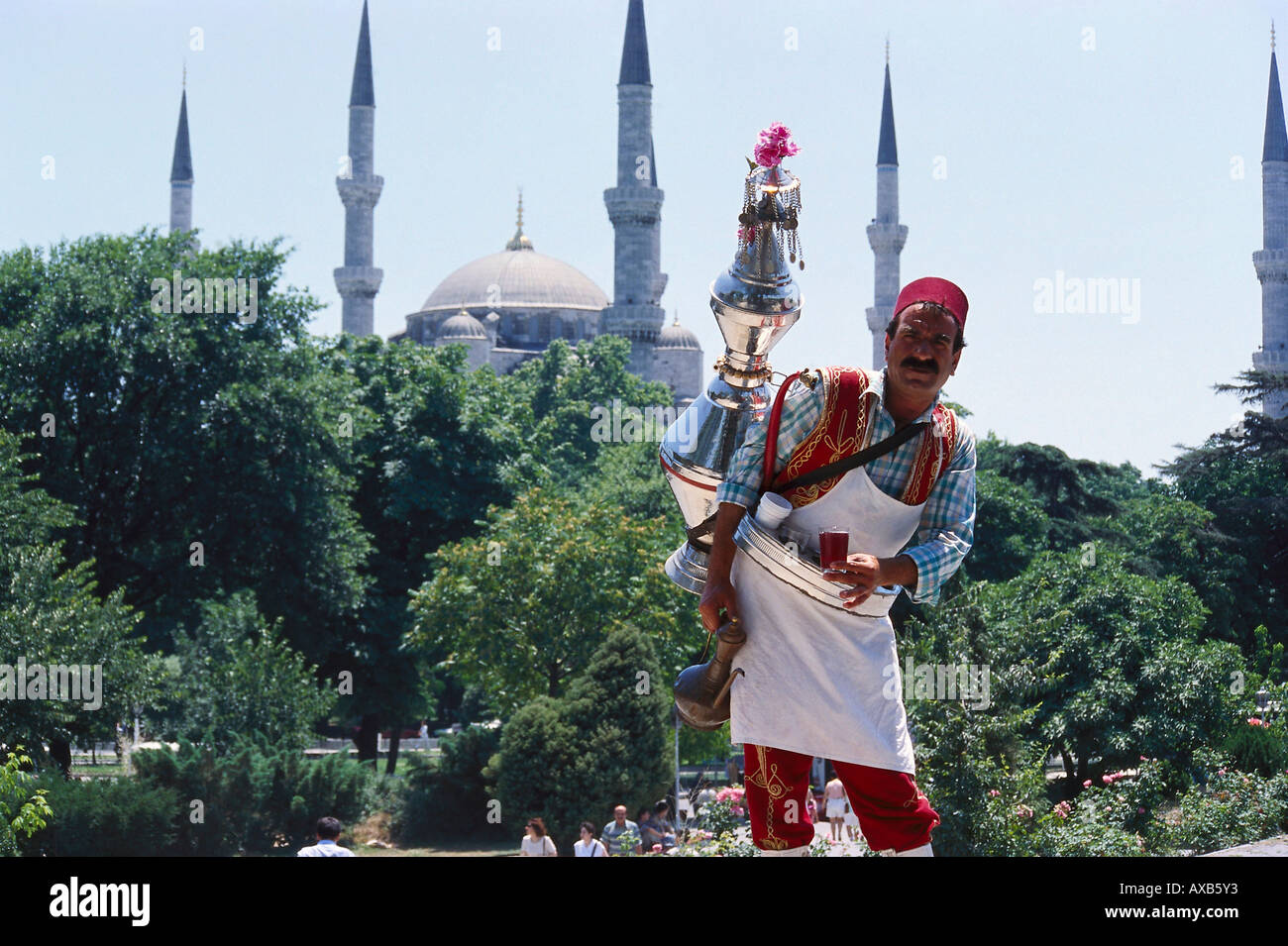 Tea vendor in traditional clothes, Blue Mosque, Istanbul, Turkey Stock ...